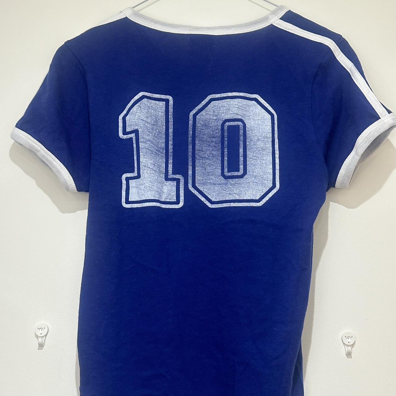 Blue and white football style shirt From Urban... | Depop