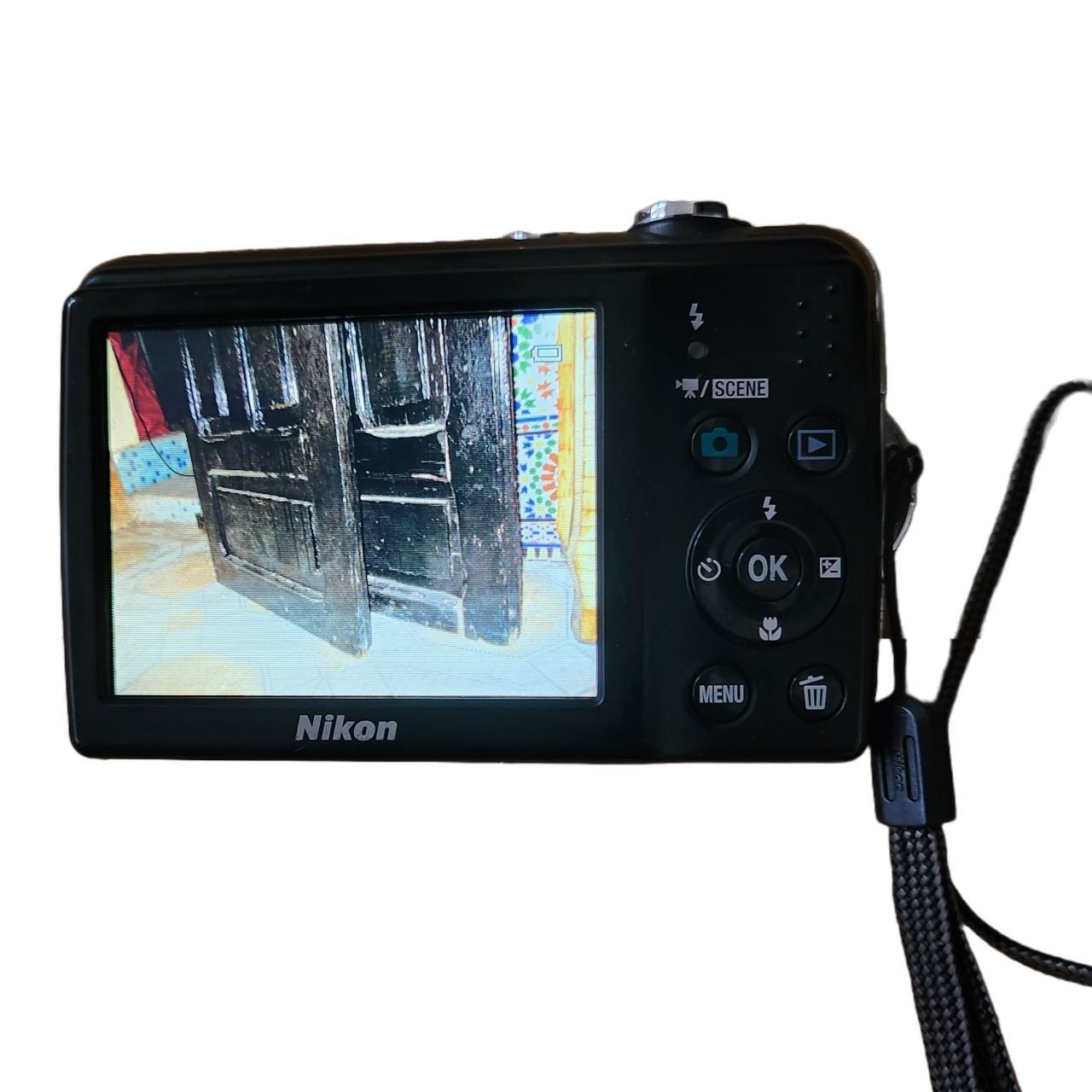 A 2012 camera, the Nikon Coolpix L23 digital... - Depop