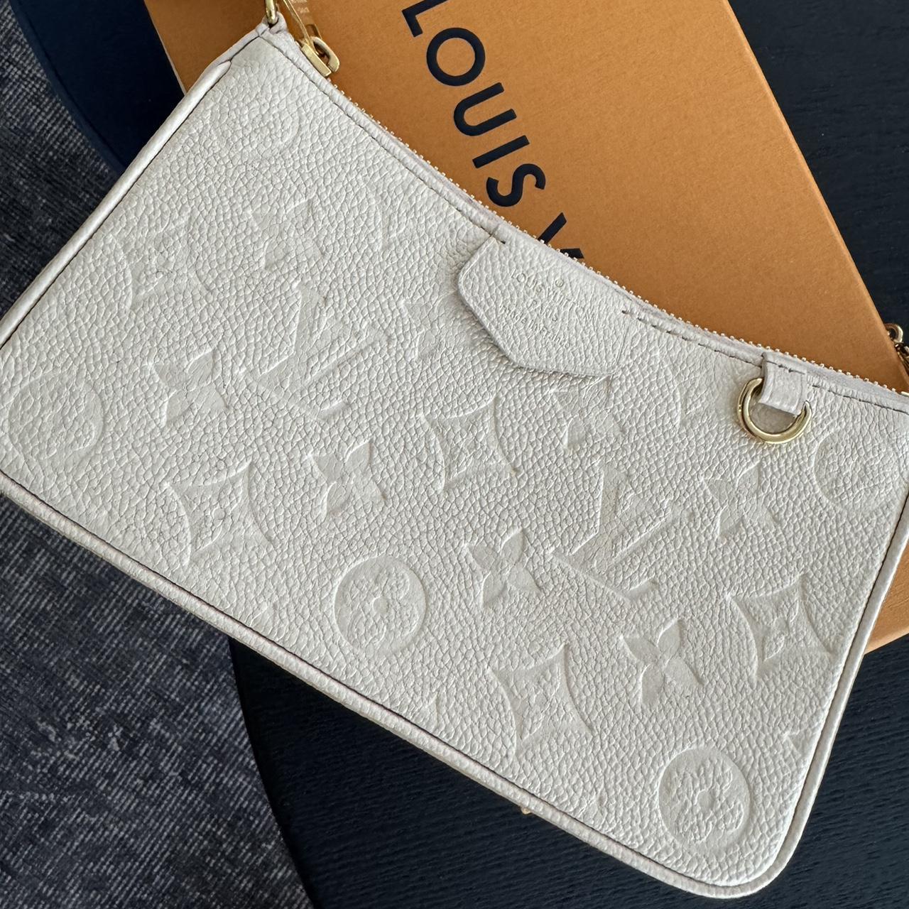 Louie Vuitton Easy Pouch On Strap leather handbag - Depop