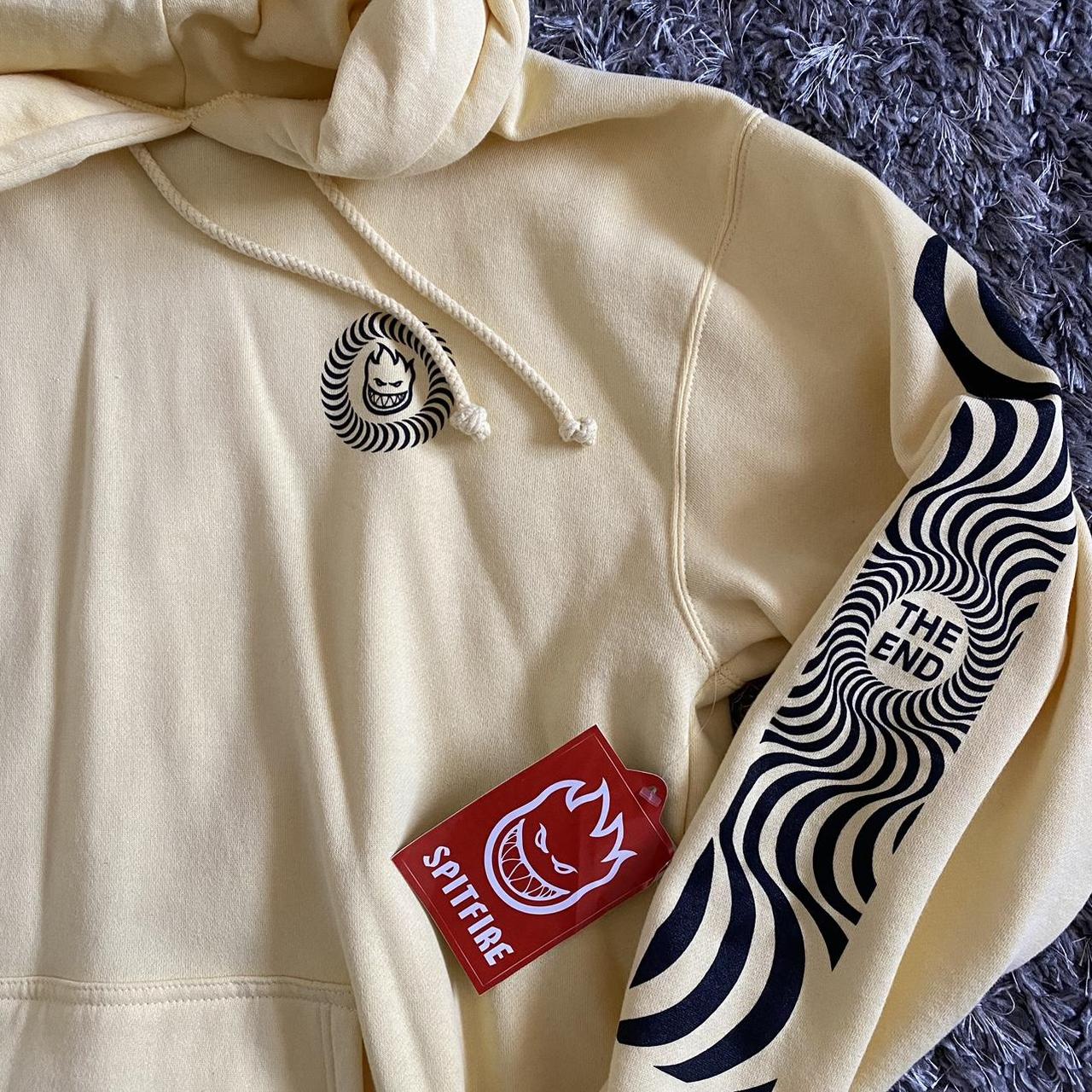 Brand new with tags pale yellow spitfire hoodie - Depop