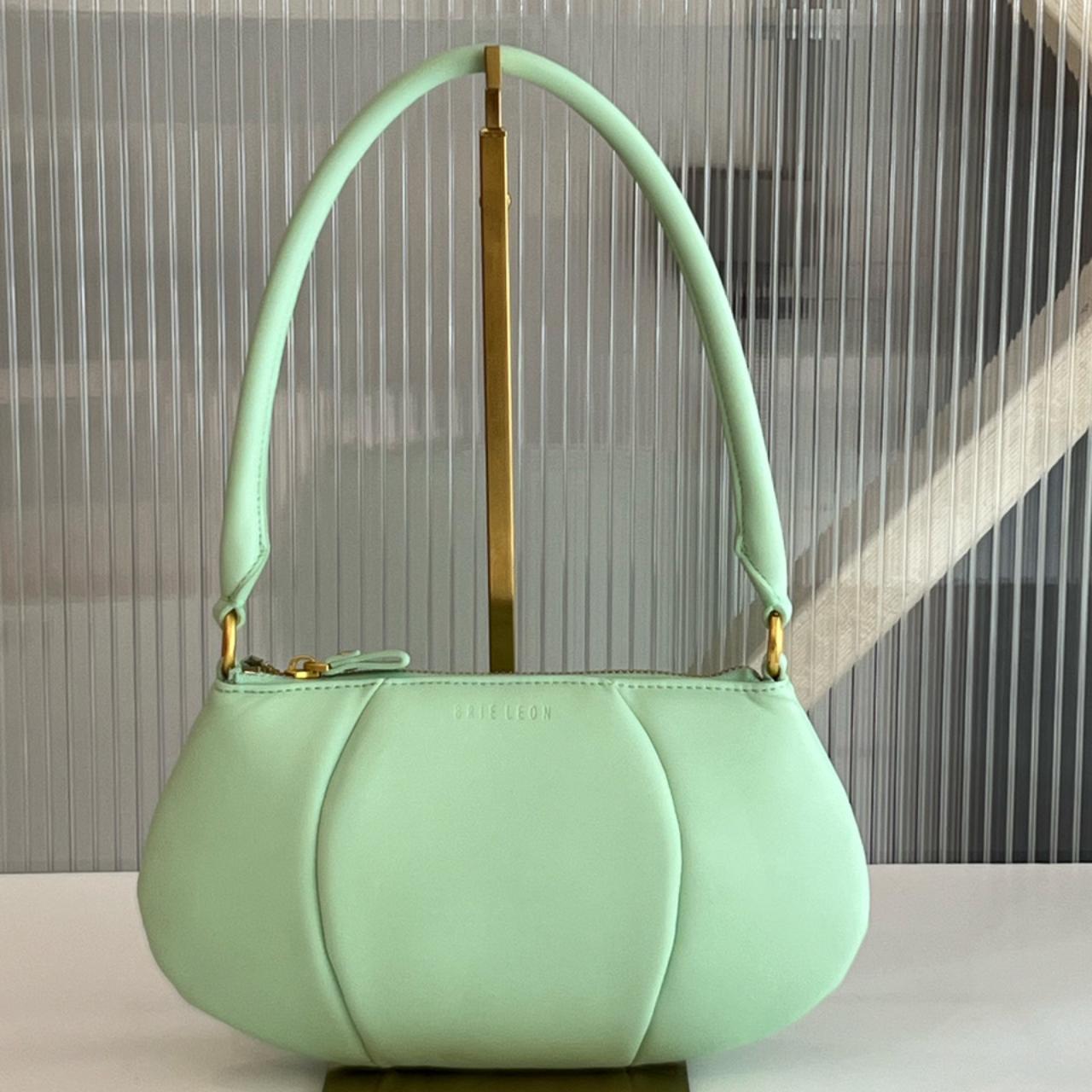 Small Remy Mint Green cross body bag no longer sold... - Depop