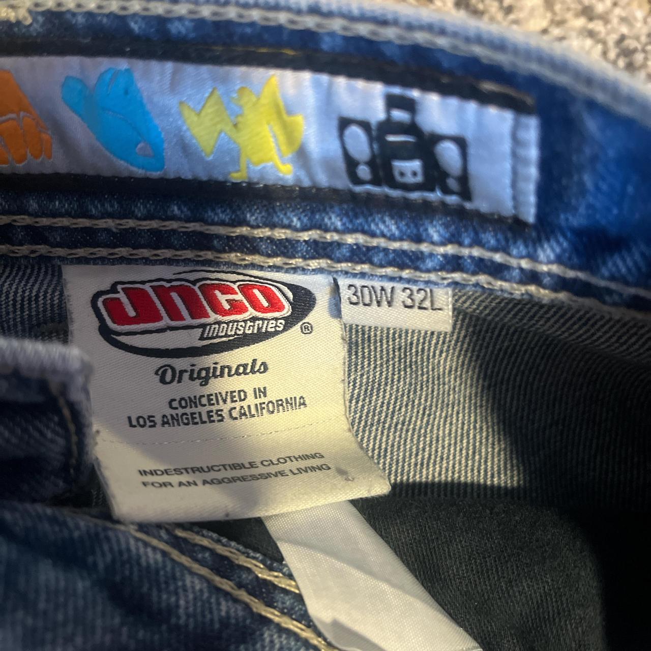 Dark Blue JNCO rolling stones Size: 30x32 some wear... - Depop