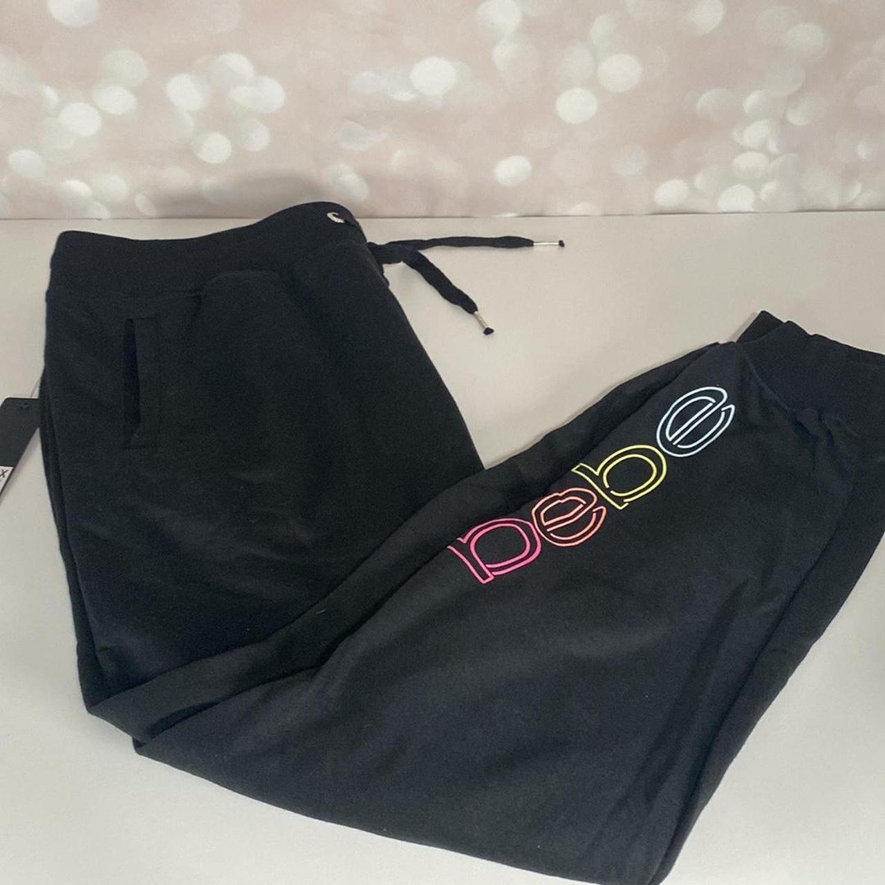 Black rainbow printed bebe joggers with drawstring... - Depop
