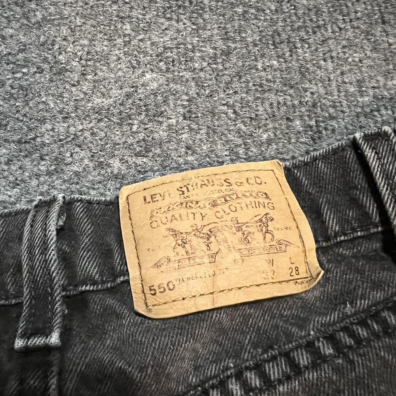 Vintage Black Cut Off Orange Tab 550 Levis Shorts... - Depop