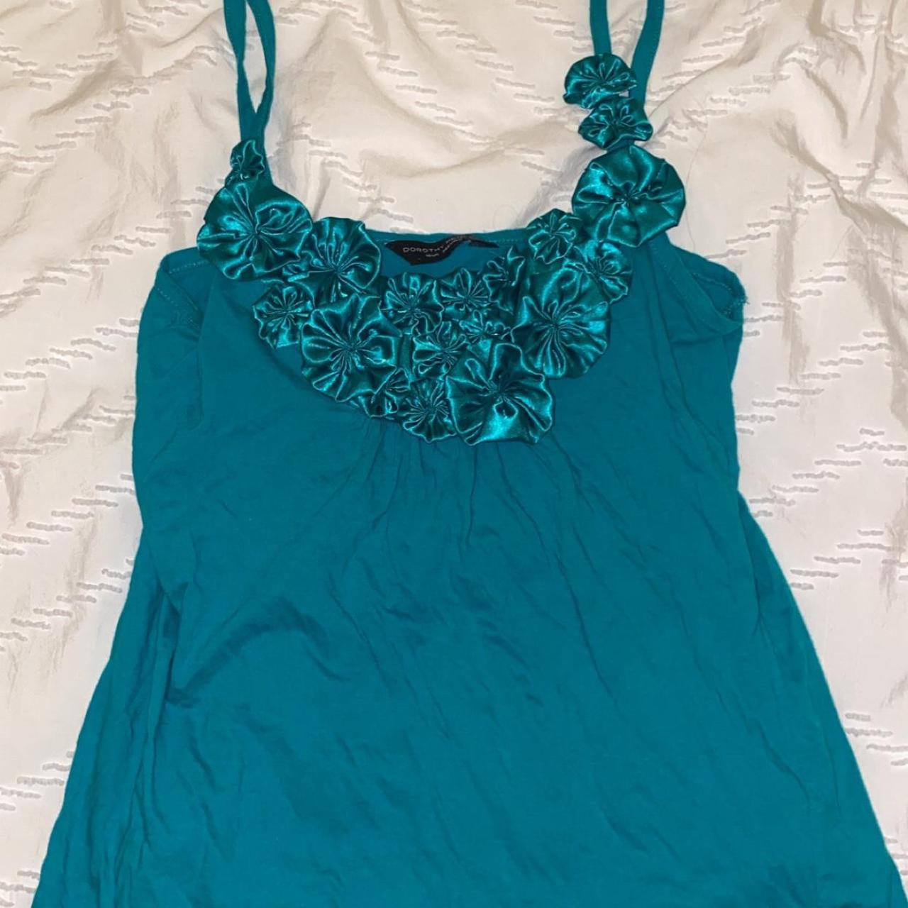 Blue top with flower pattern Size 10 Great condition - Depop