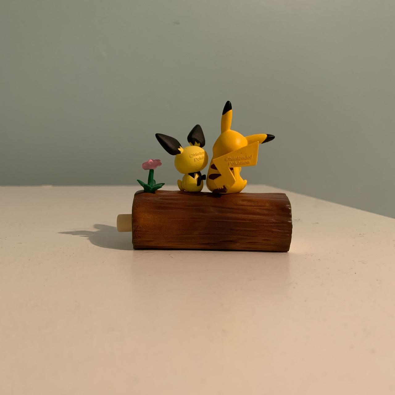 pikachu + pichu log figure dm if you have any... - Depop