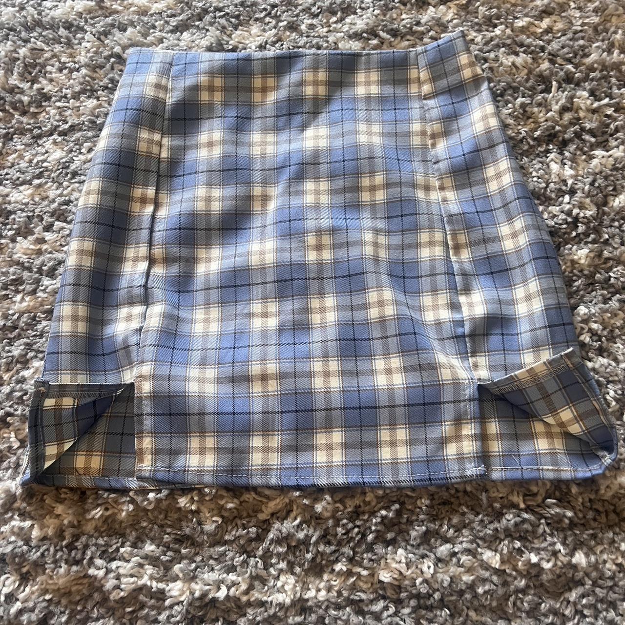 Blue plaid mini skirt. I think it’s shein or forever... - Depop