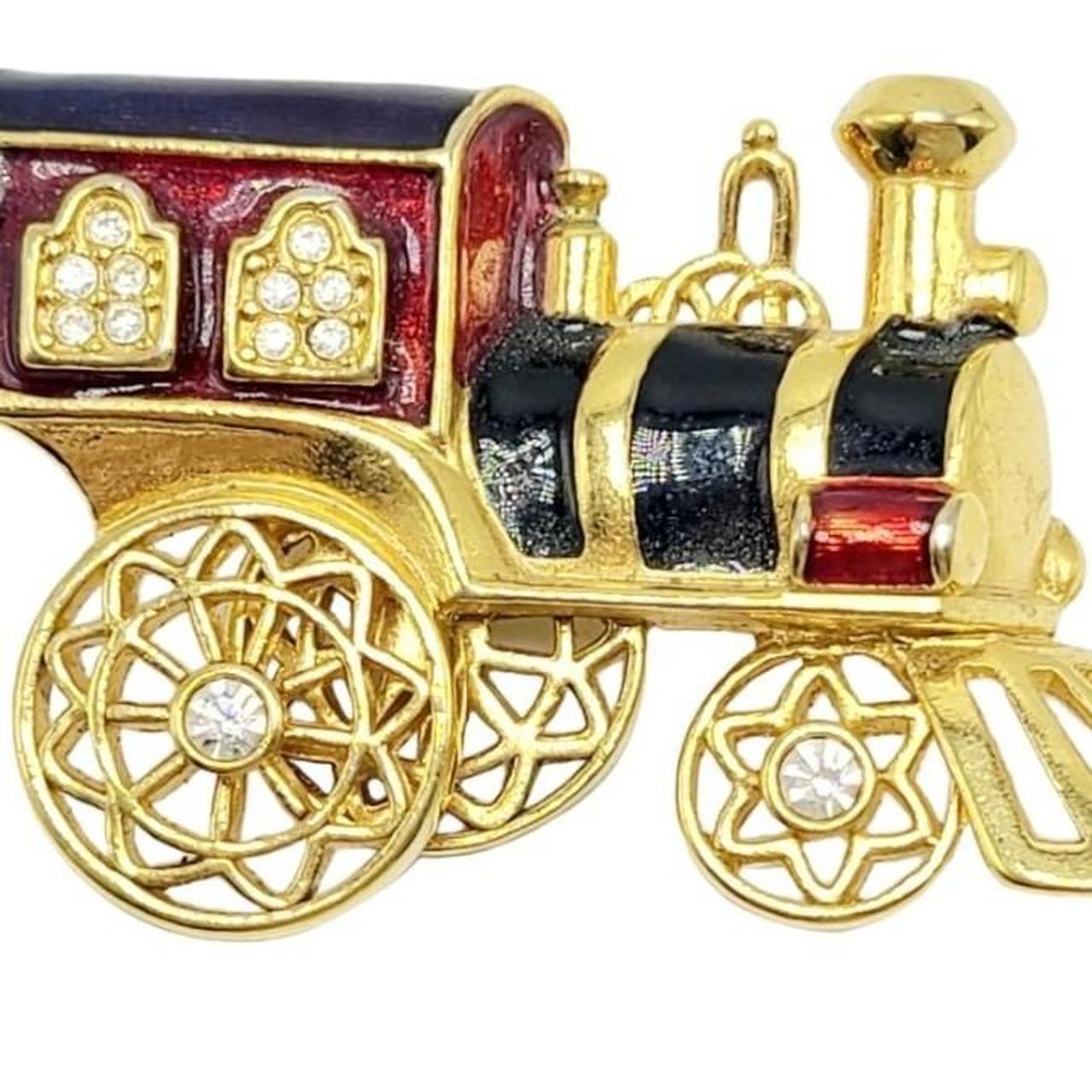 Avon Smithsonian goldtone train brooch | Depop