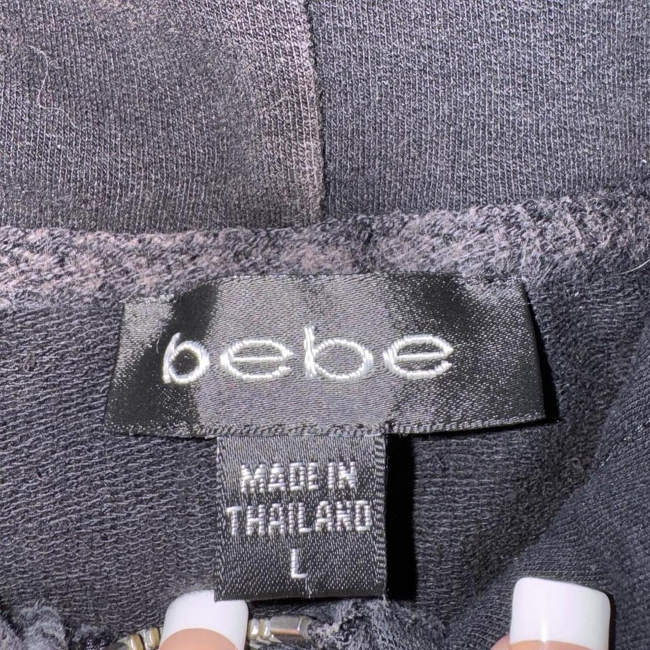 bebe rhinestone short sleeve track suit top, size... - Depop