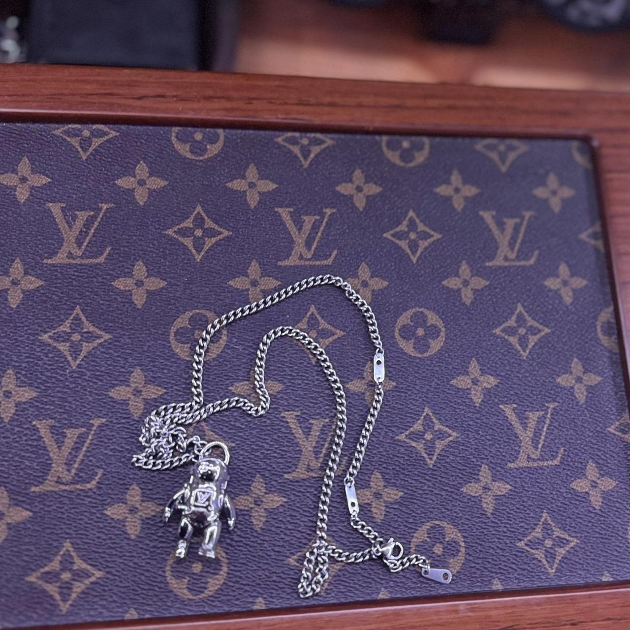 LV astronaut chain | Depop