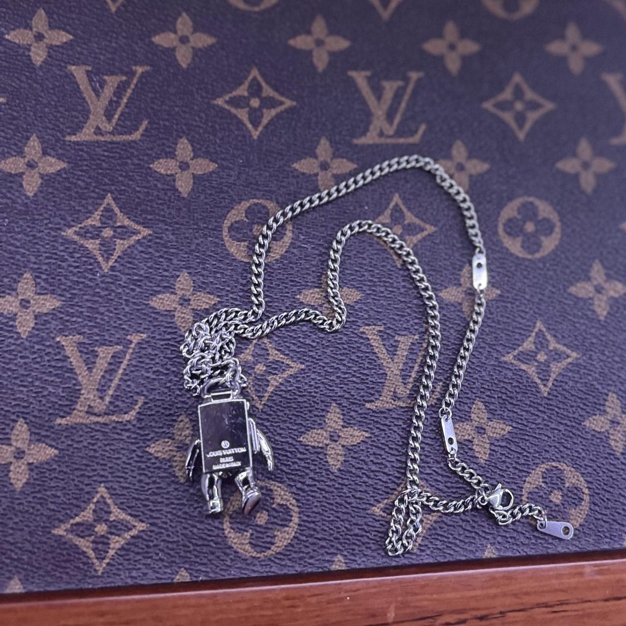 LV astronaut chain | Depop