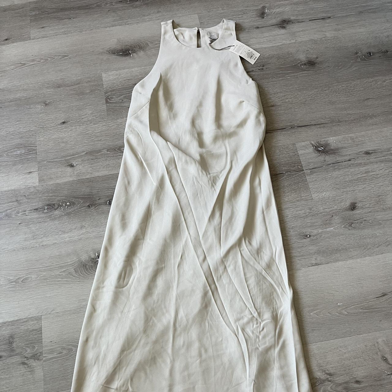 Satin cream colored dress with a slit at the... - Depop