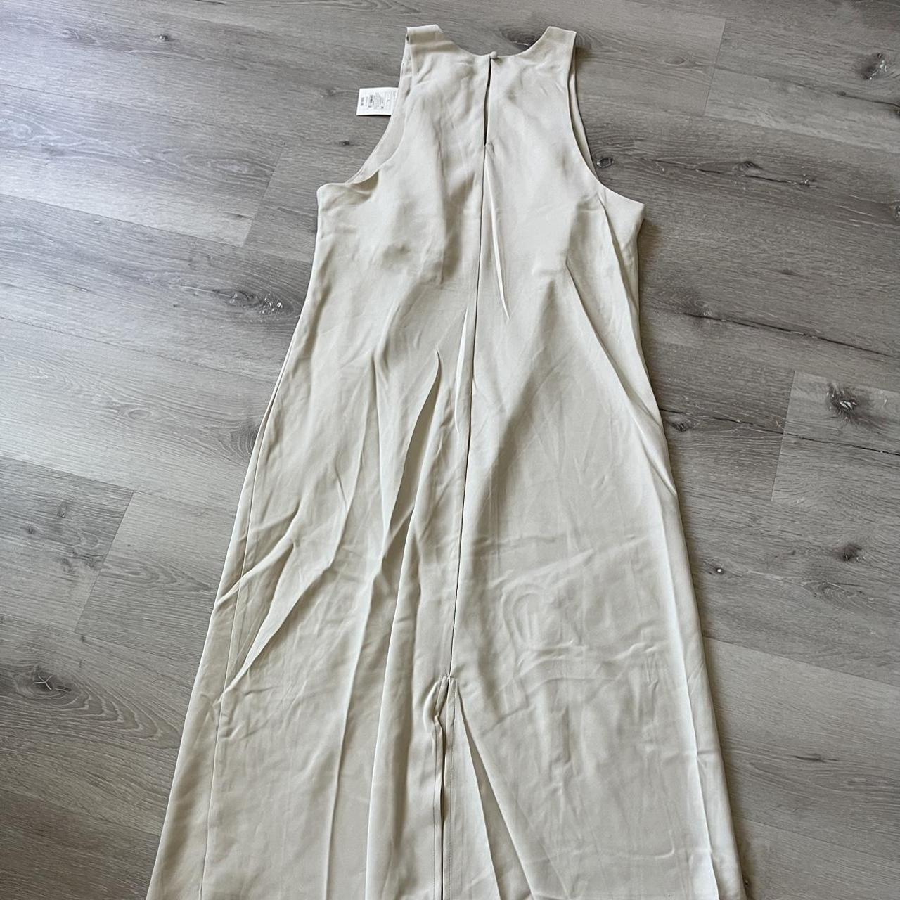 Satin cream colored dress with a slit at the... - Depop