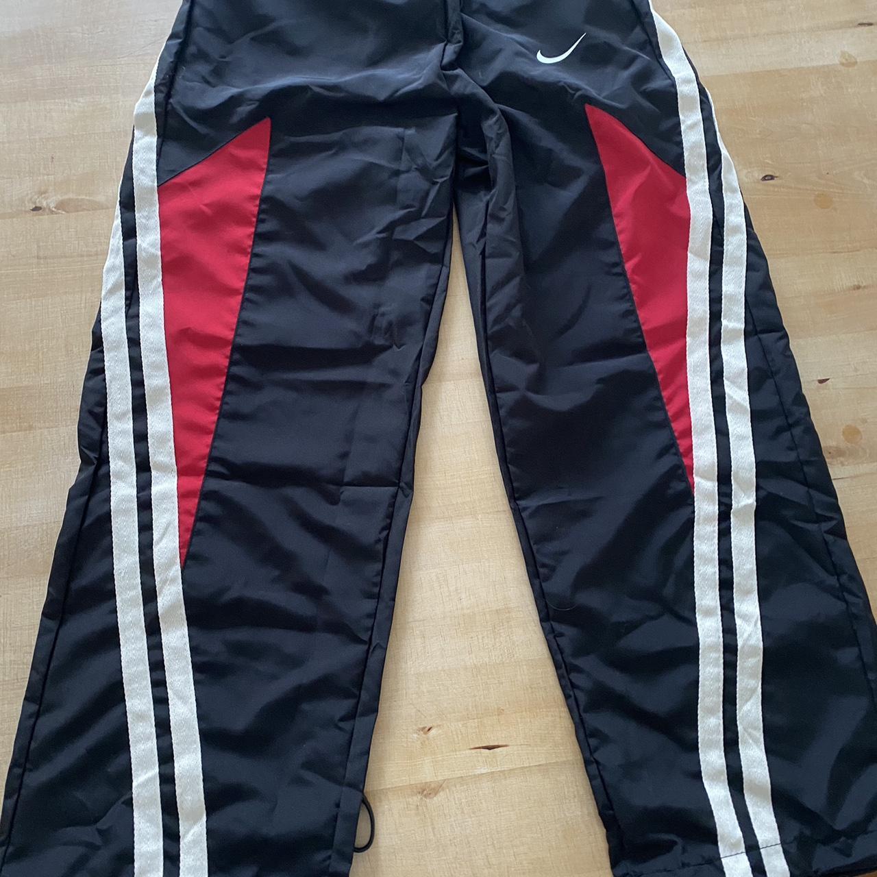 Nike vintage trackies fairly worn. - Depop