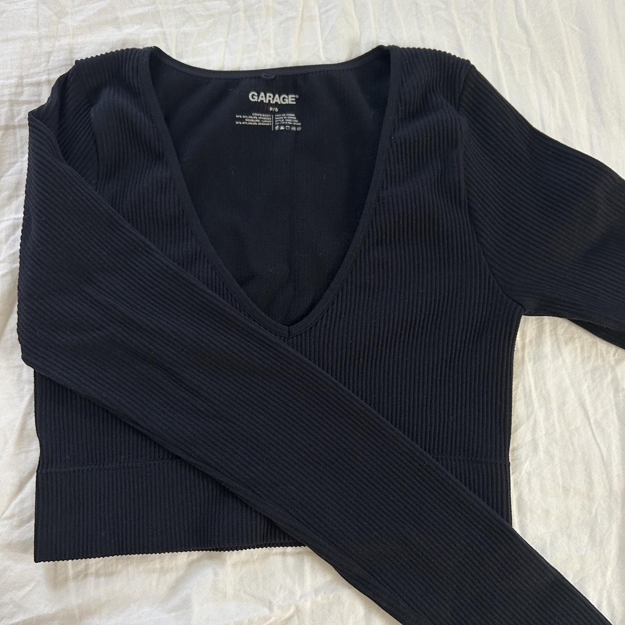 garage seamless black long sleeve top... - Depop