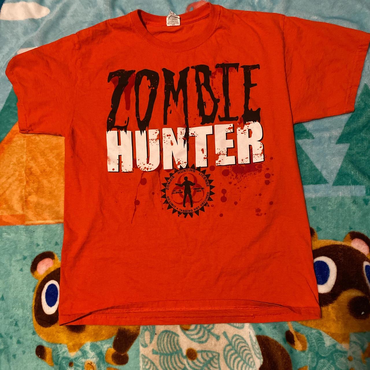 Orange Zombie Hunter tee #horror #zombie... | Depop