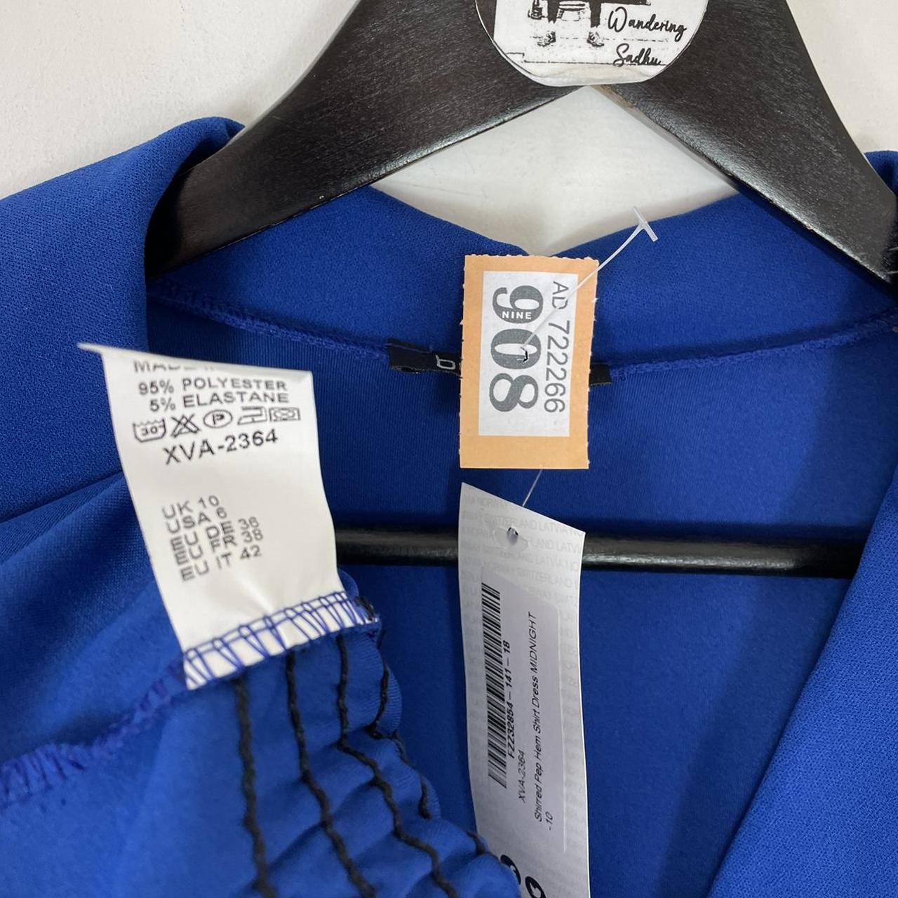 O908 Blue hem shirt dress midnight brand new from... - Depop