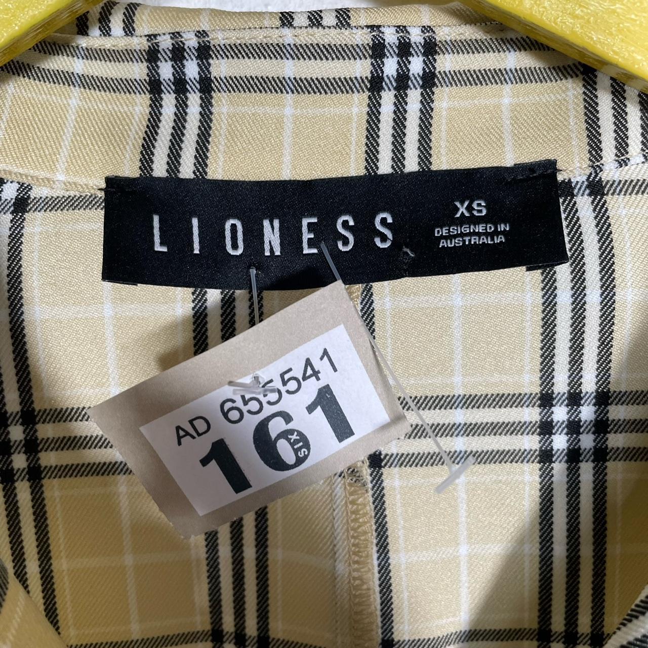 S161 Black and yellow chequered dress from Lioness... - Depop