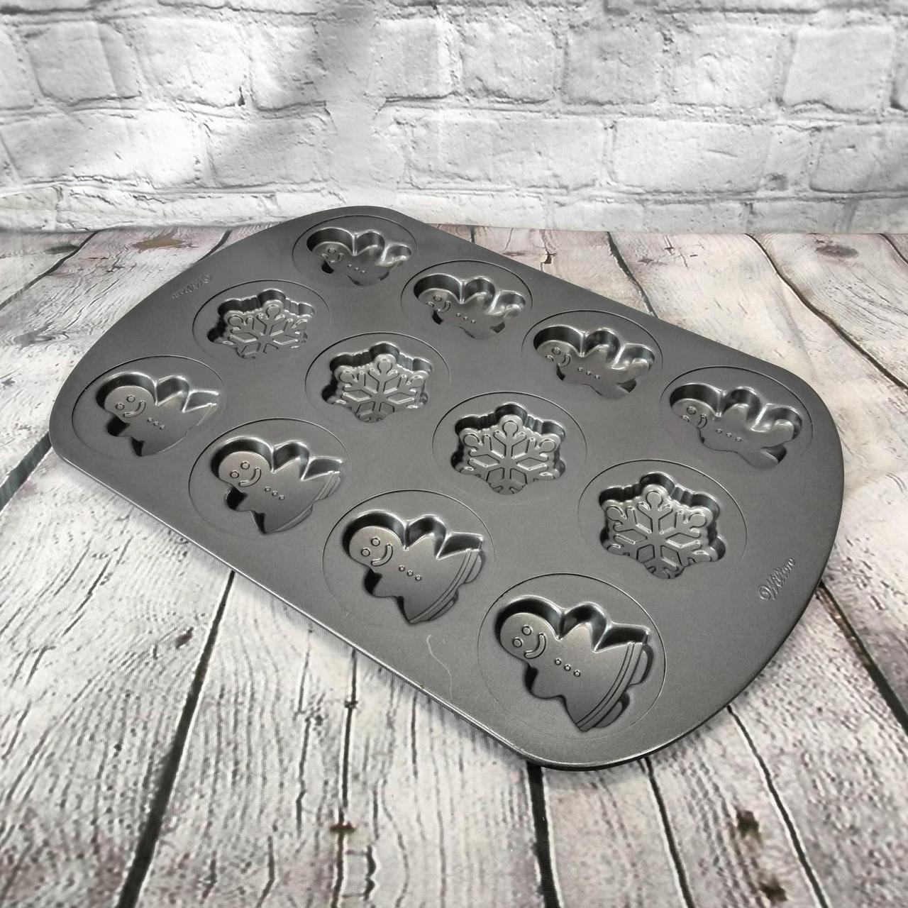 WILTON Cookie Pan 12 in 1-4 SNOWFLAKE, GINGERBREAD... - Depop