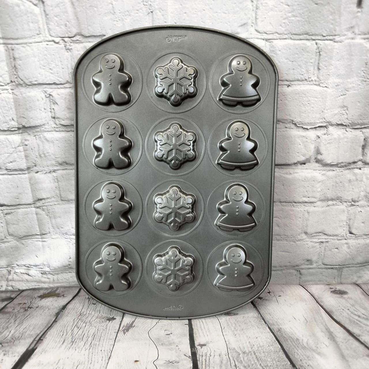 WILTON Cookie Pan 12 in 1-4 SNOWFLAKE, GINGERBREAD... - Depop