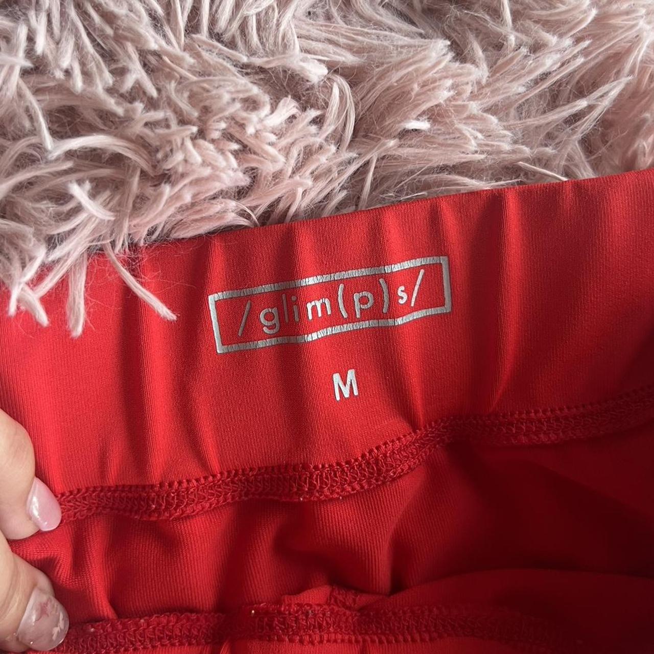Medium red workout shorts/spandex. Thigh length.... - Depop