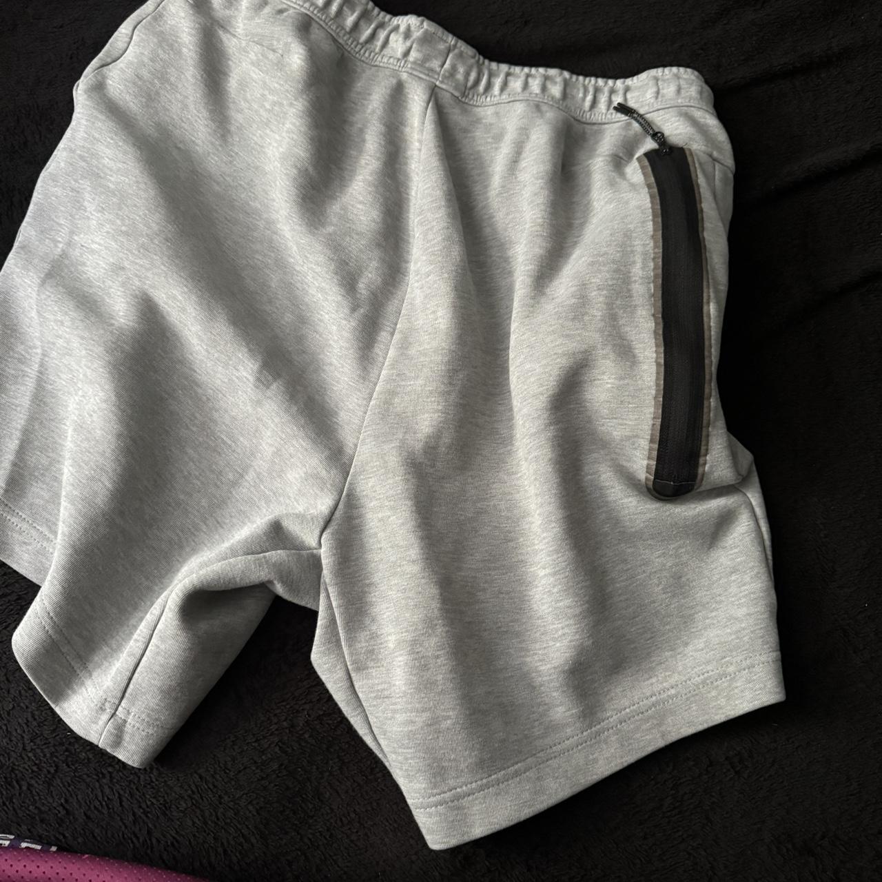 nike grey tech shorts - Depop