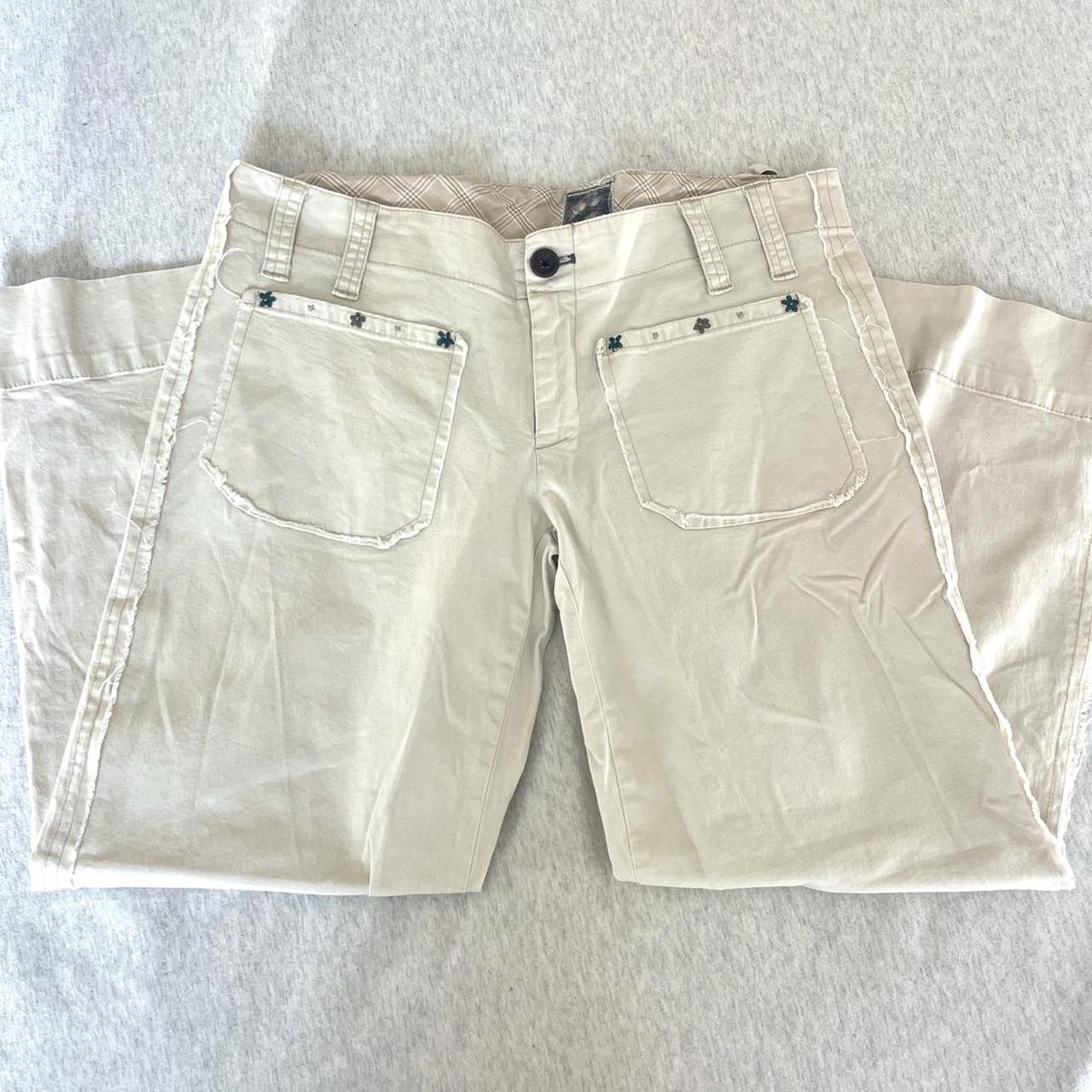 Cream capri pants with blue embroidered flowers. The... - Depop