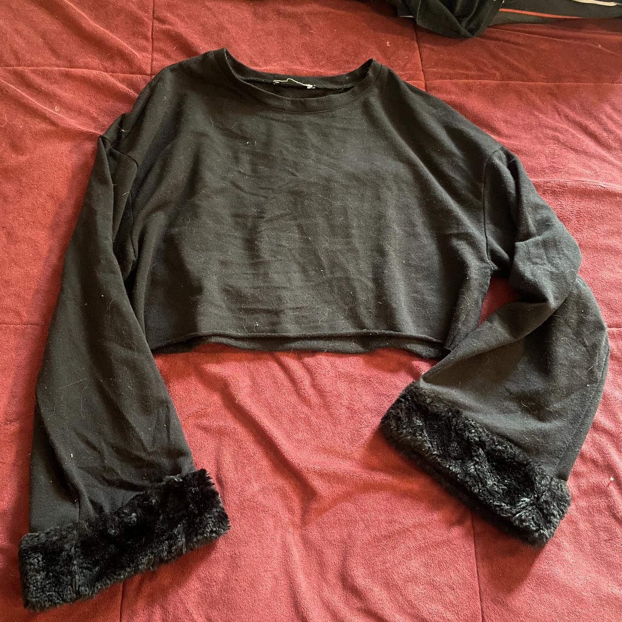 Black cropped long sleeve top. Fun fuzzy trim on the... - Depop