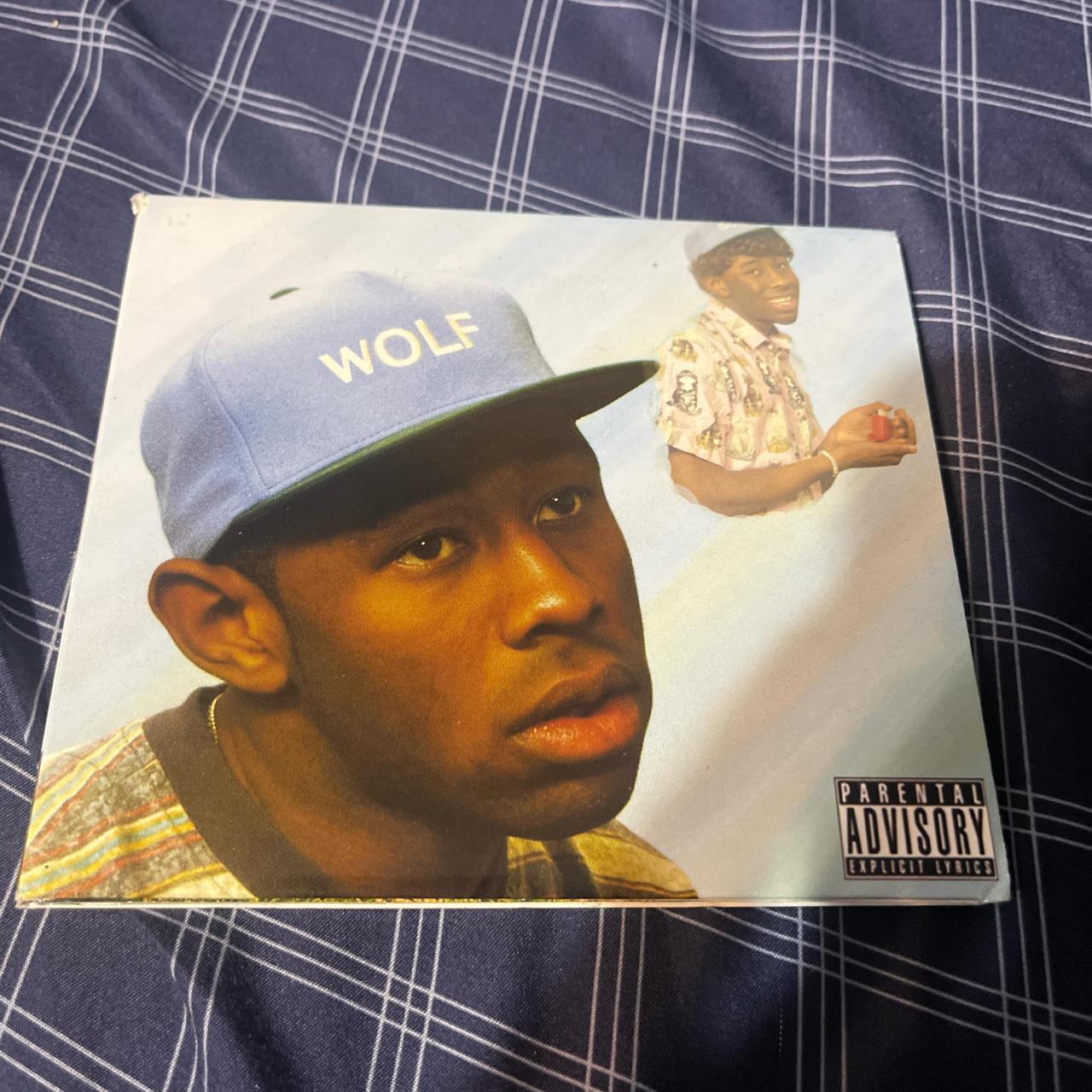 Tyler, the Creator Wolf CD packaging has a few... - Depop