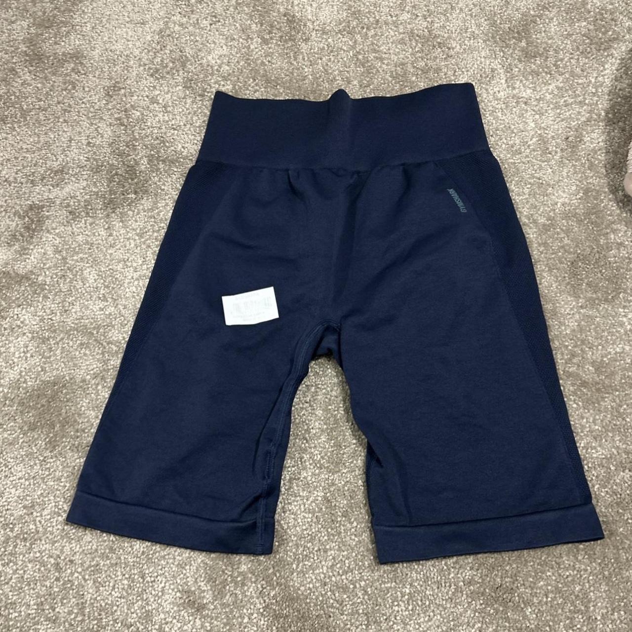 Navy gymshark cycling shorts Size small Sticker has... - Depop