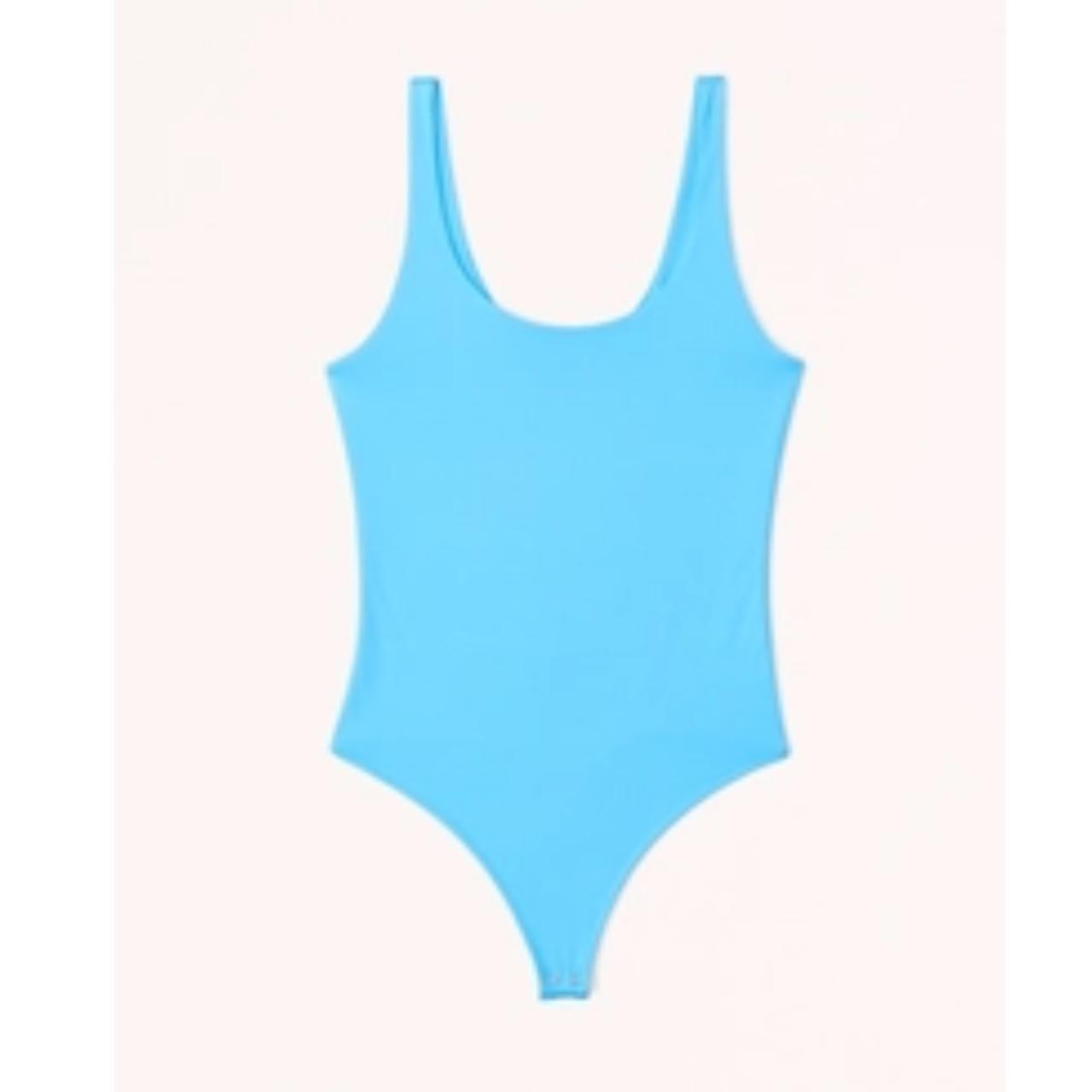 Light blue bodysuit with scoop neckline - Depop