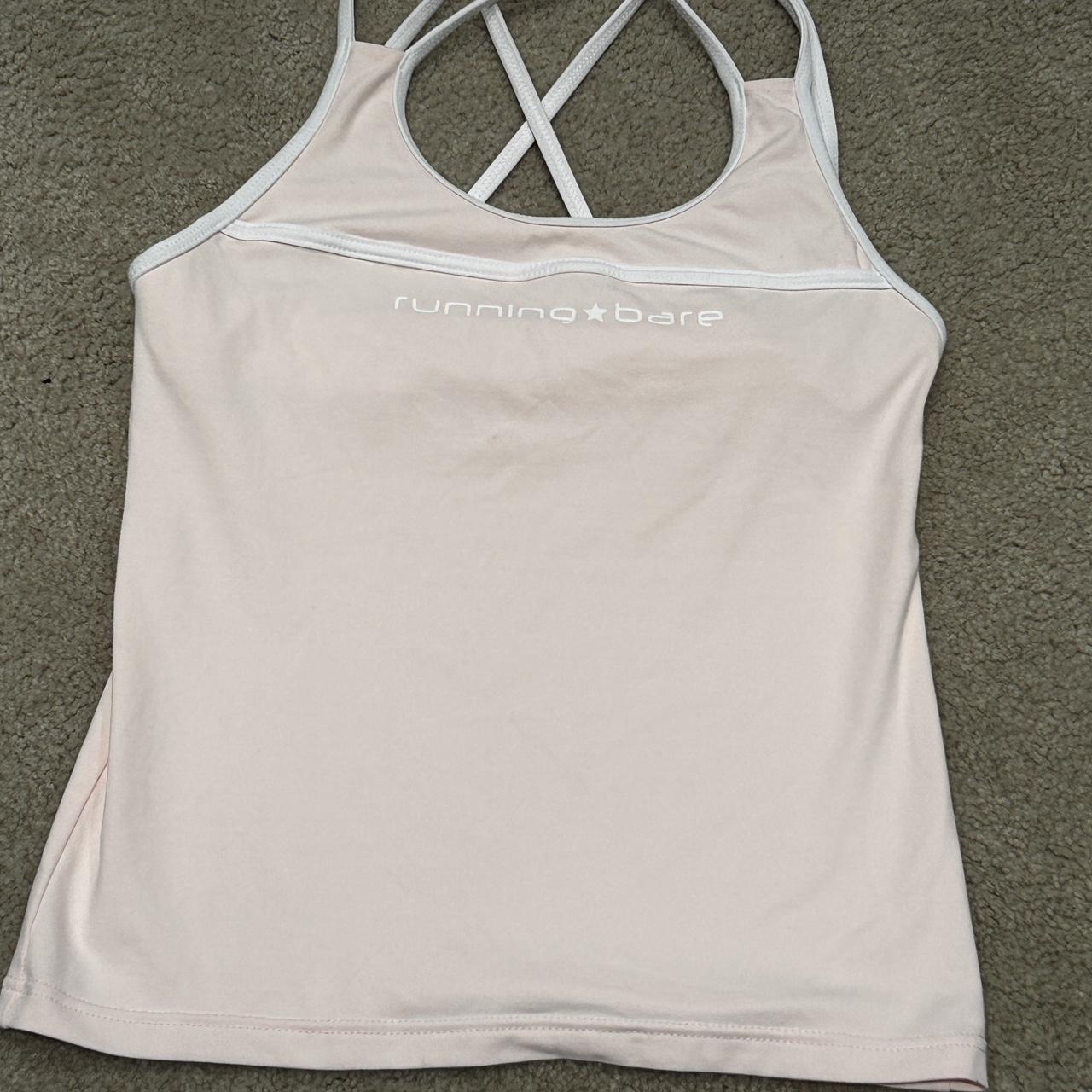 Light Pink ‘running bare’ cross over singlet top... - Depop