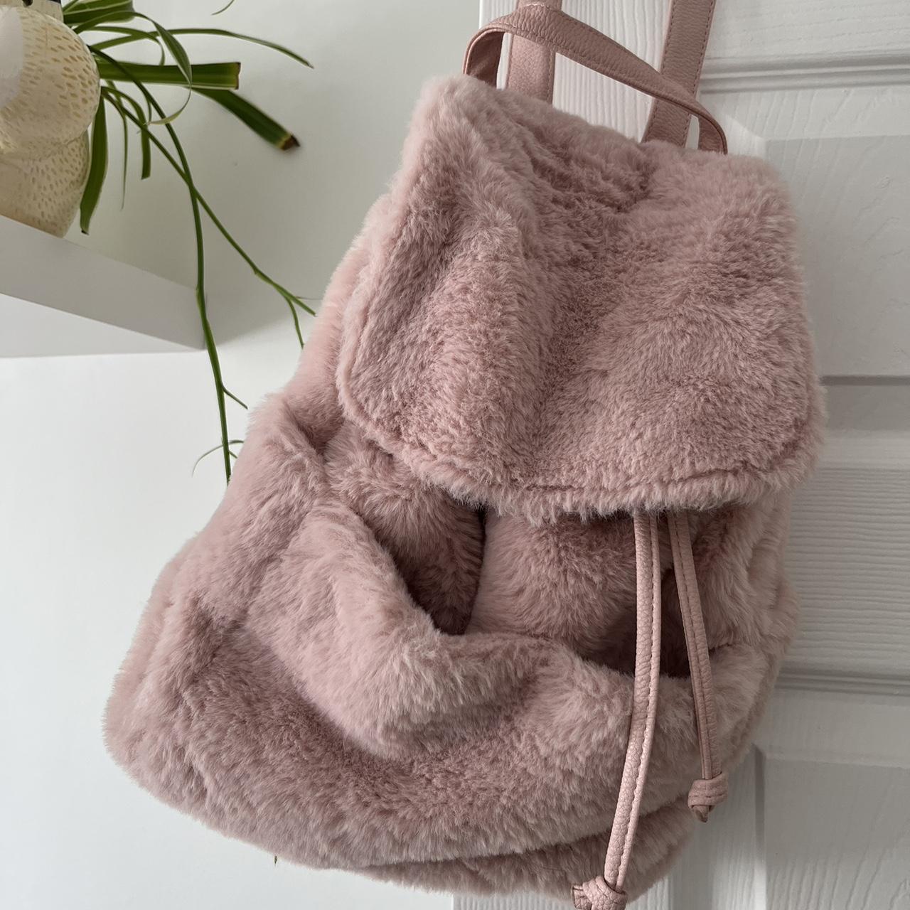 Pink fluffy backpack. So cute for festivals. Used... - Depop
