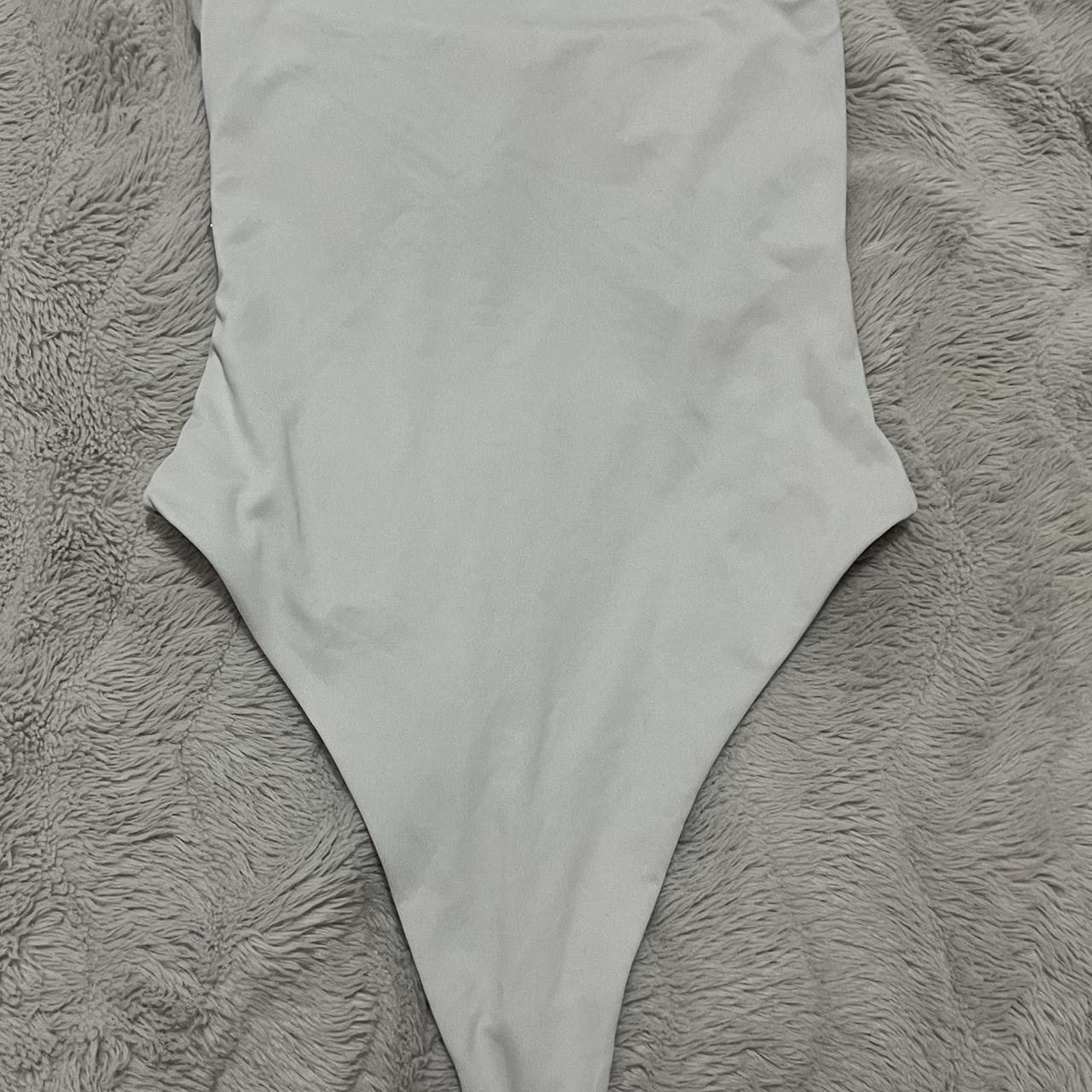 Supre strapless bodysuit Worn once Size xxs - Depop