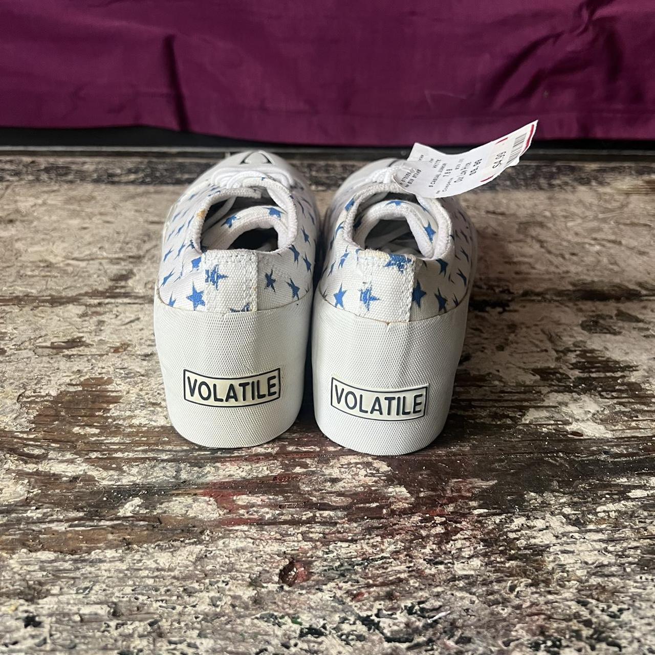 Volatile Women's White and Blue Trainers | Depop