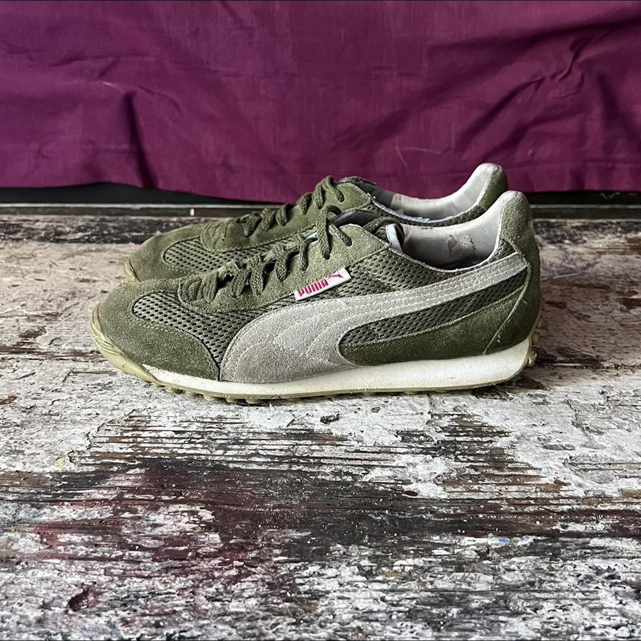 A nice pair of 2000s Pumas in a nice grassy... - Depop