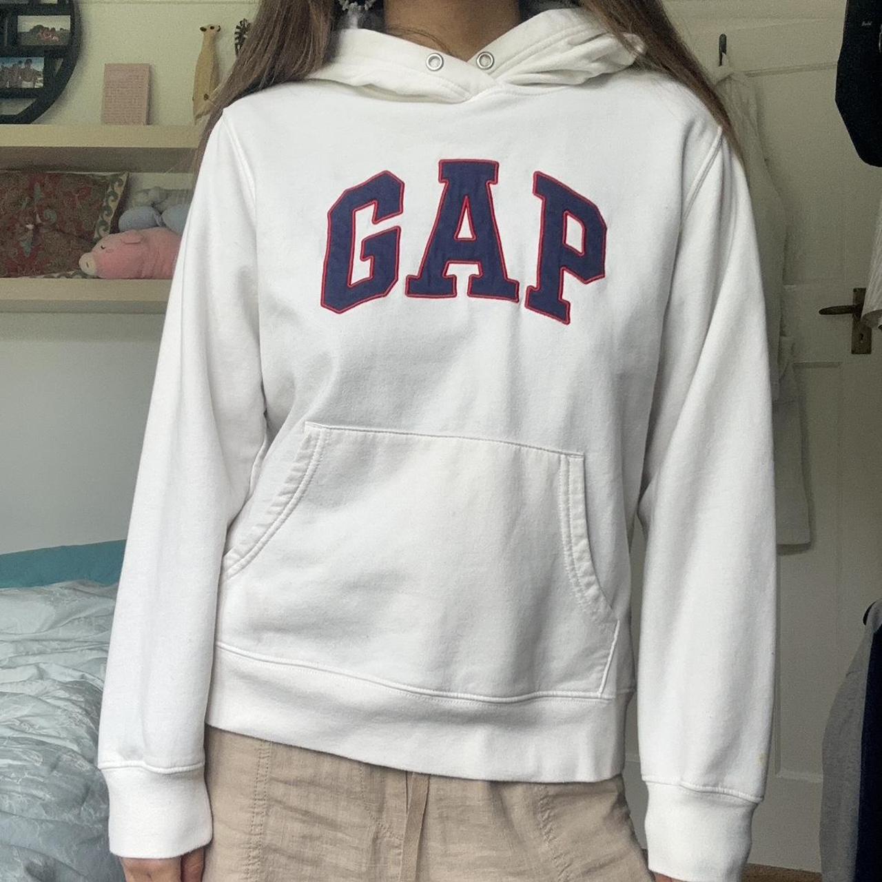 White GAP hoodie with GAP written in blue /navy &... - Depop