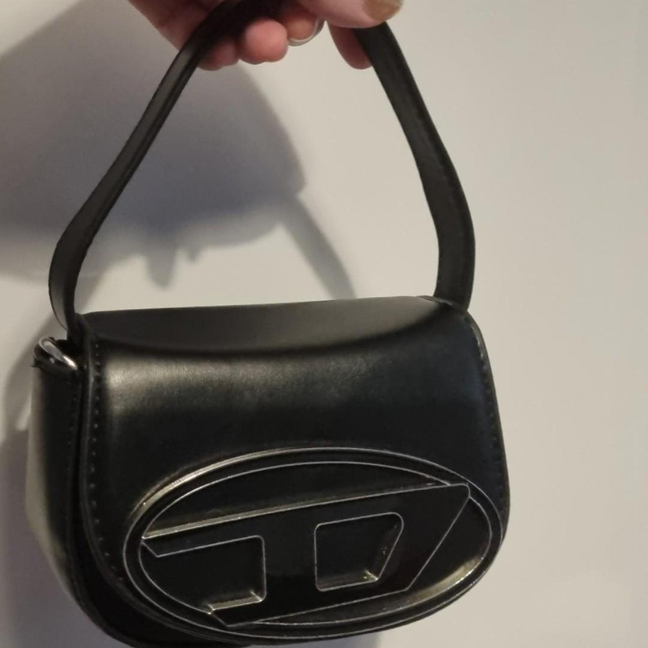 Black mini D bag comes with crossbody strap as well... - Depop