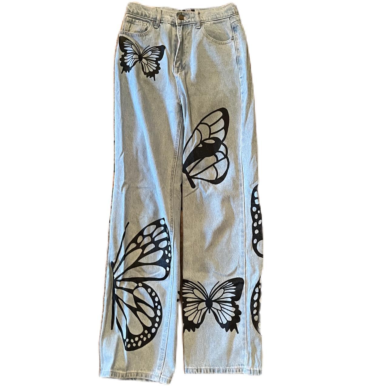 Loose fit, light denim, butterfly prints on front... - Depop