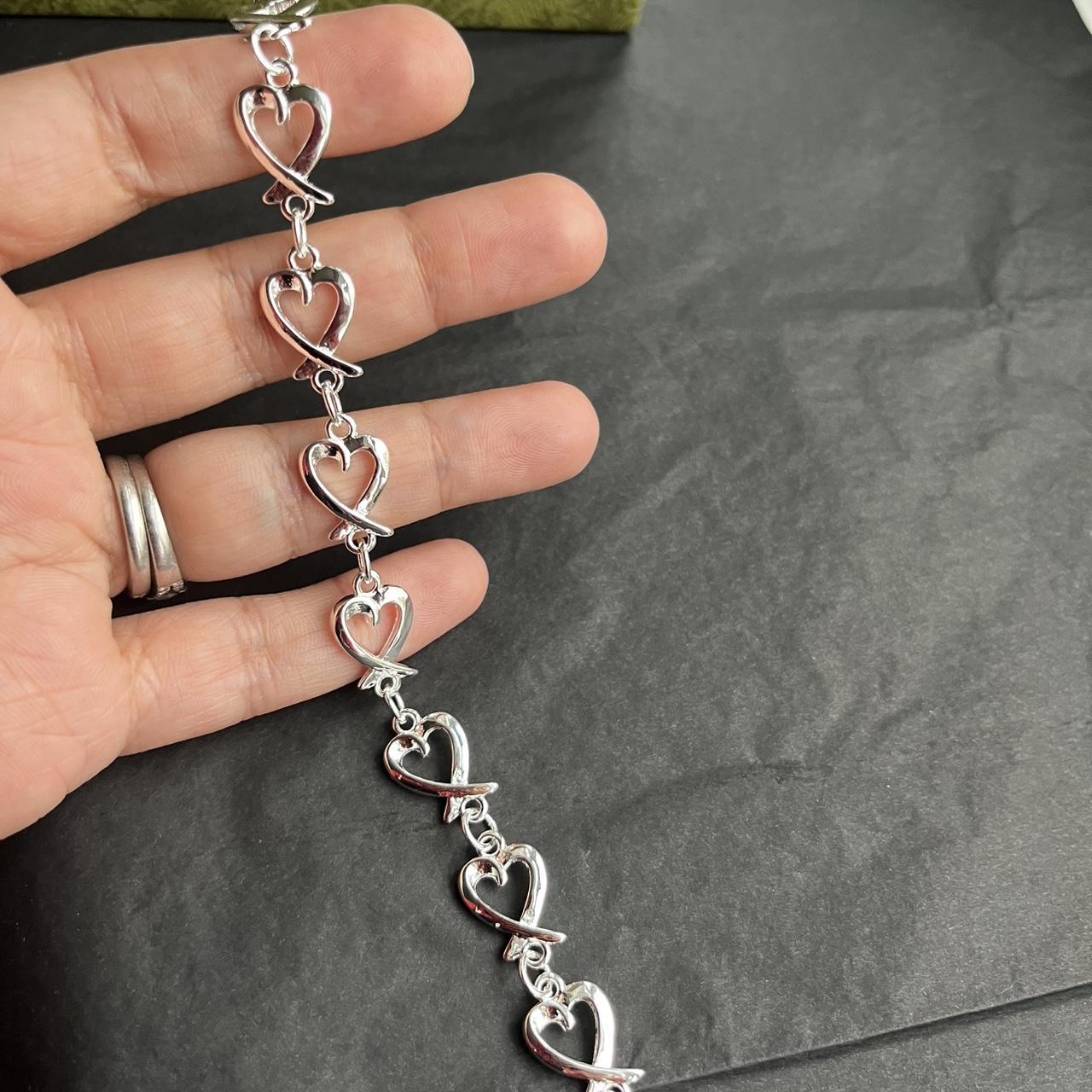 Sterling silver heart charm bracelet , hallmarked... - Depop