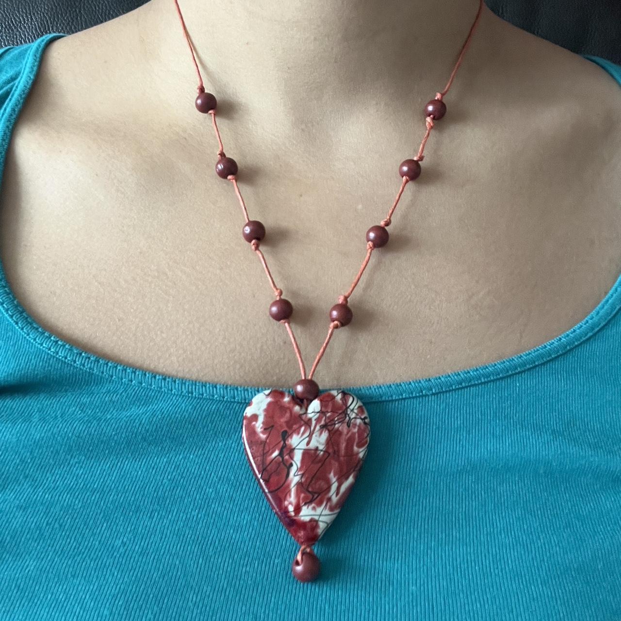 Handmade red heart pendant necklace with red waxed... - Depop