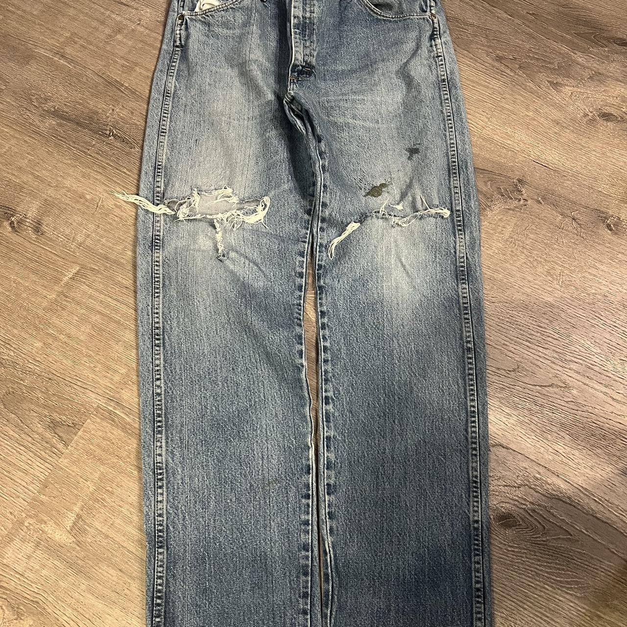 Light blue ripped wrangler jeans Size: 38 x... - Depop