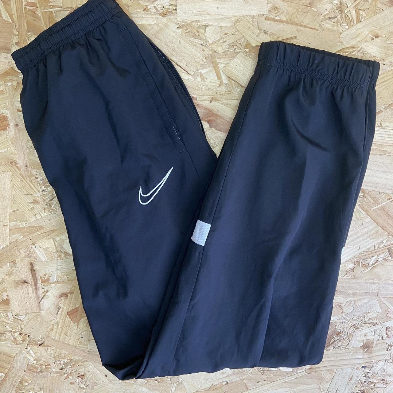 Nike vintage joggers baggy. Black. Elasticated cuff.... - Depop