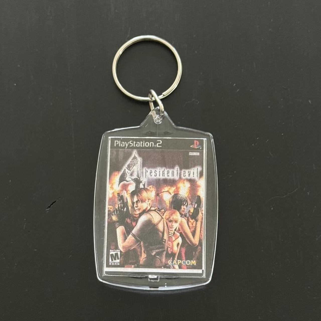 Y2k ps2 resident evil 4 game keychain Grunge... - Depop