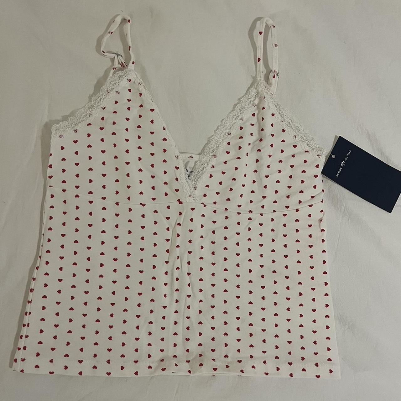 brandy melville heart + lace tank no longer sold!... - Depop