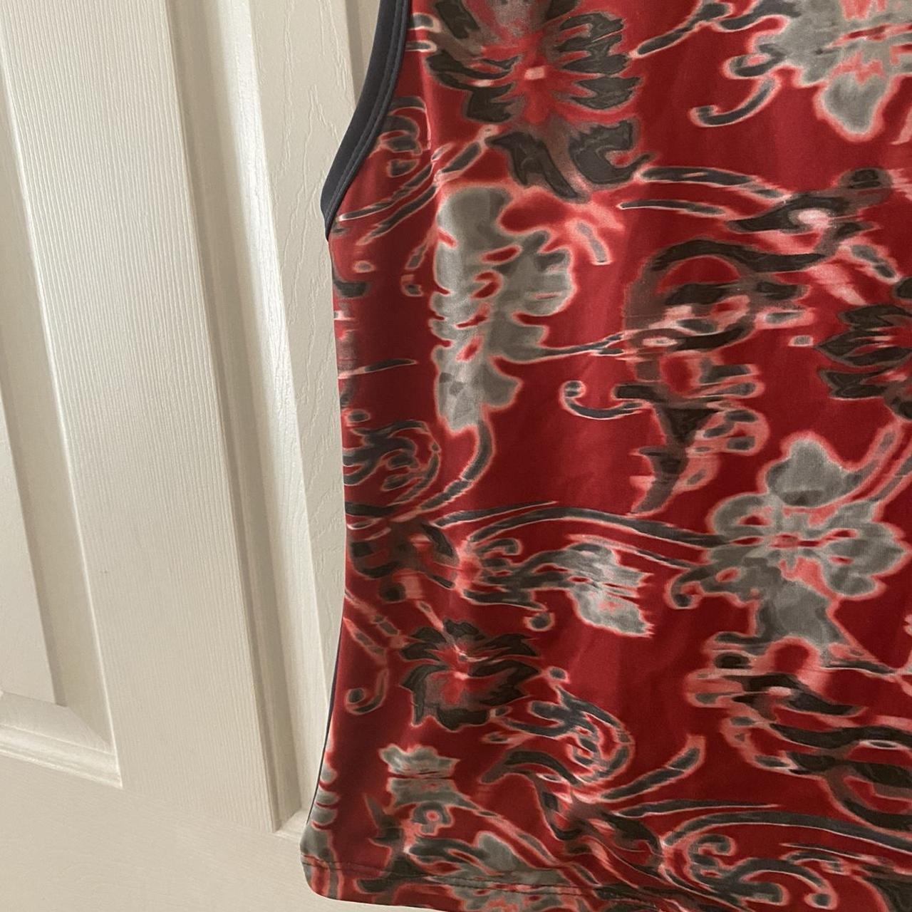 Red pattern shirt with dark grey back Size... - Depop