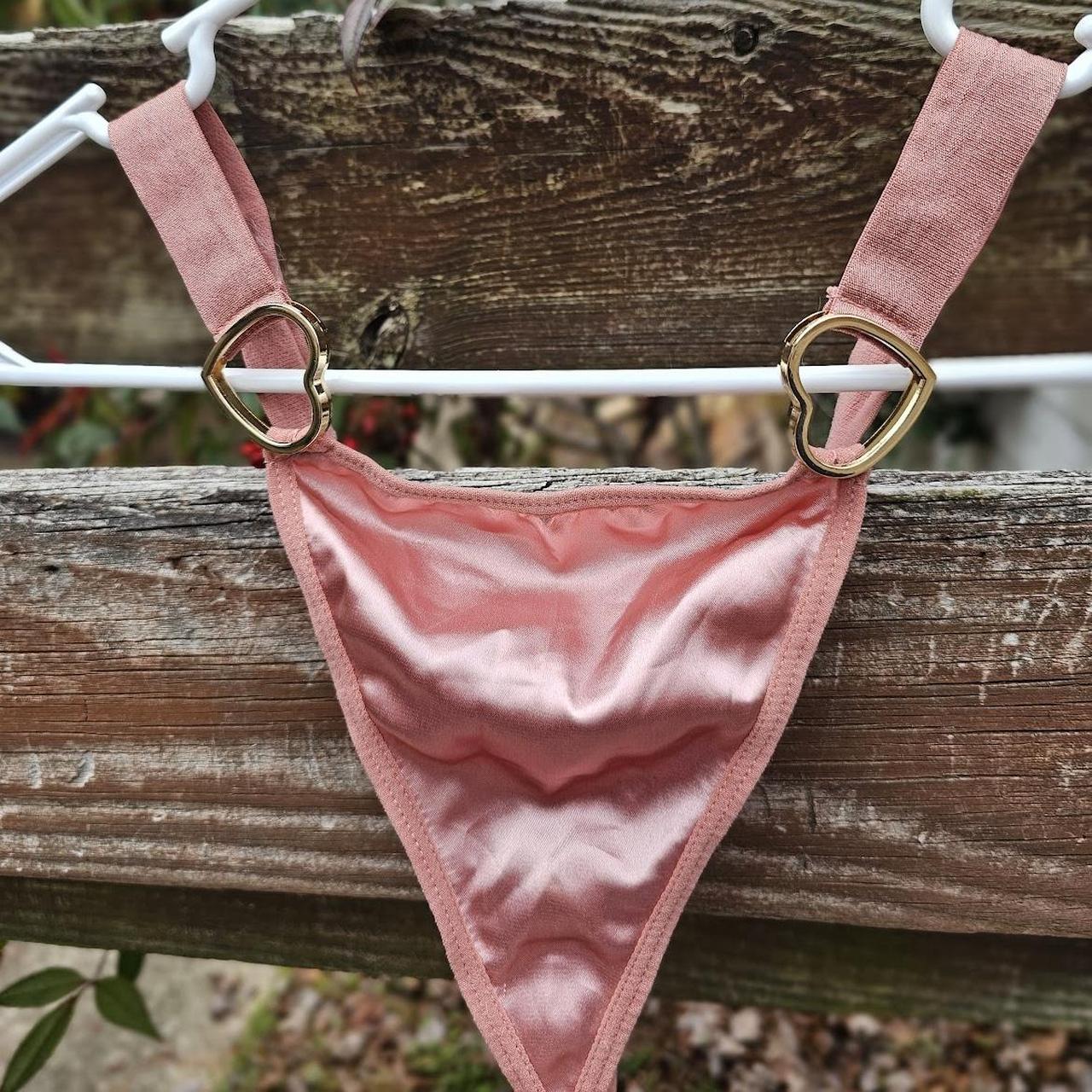 Pink silk thong panties with heart rings on sides... - Depop