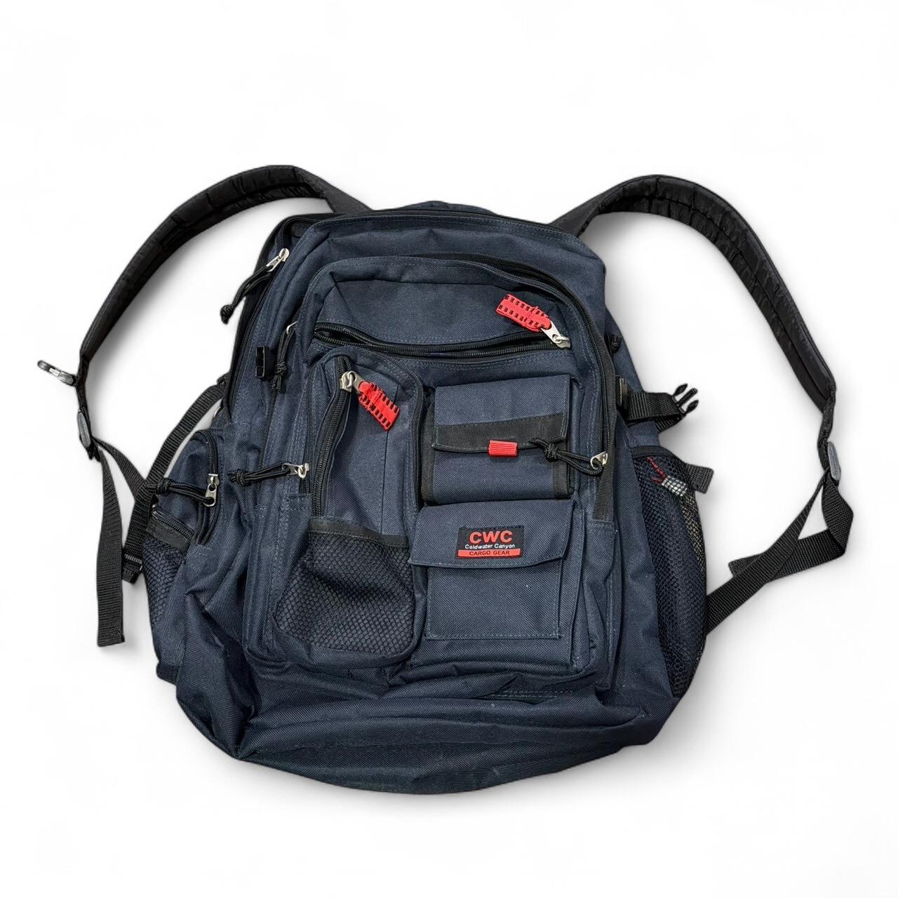 Black CWC backpack with multiple pockets. Like... | Depop