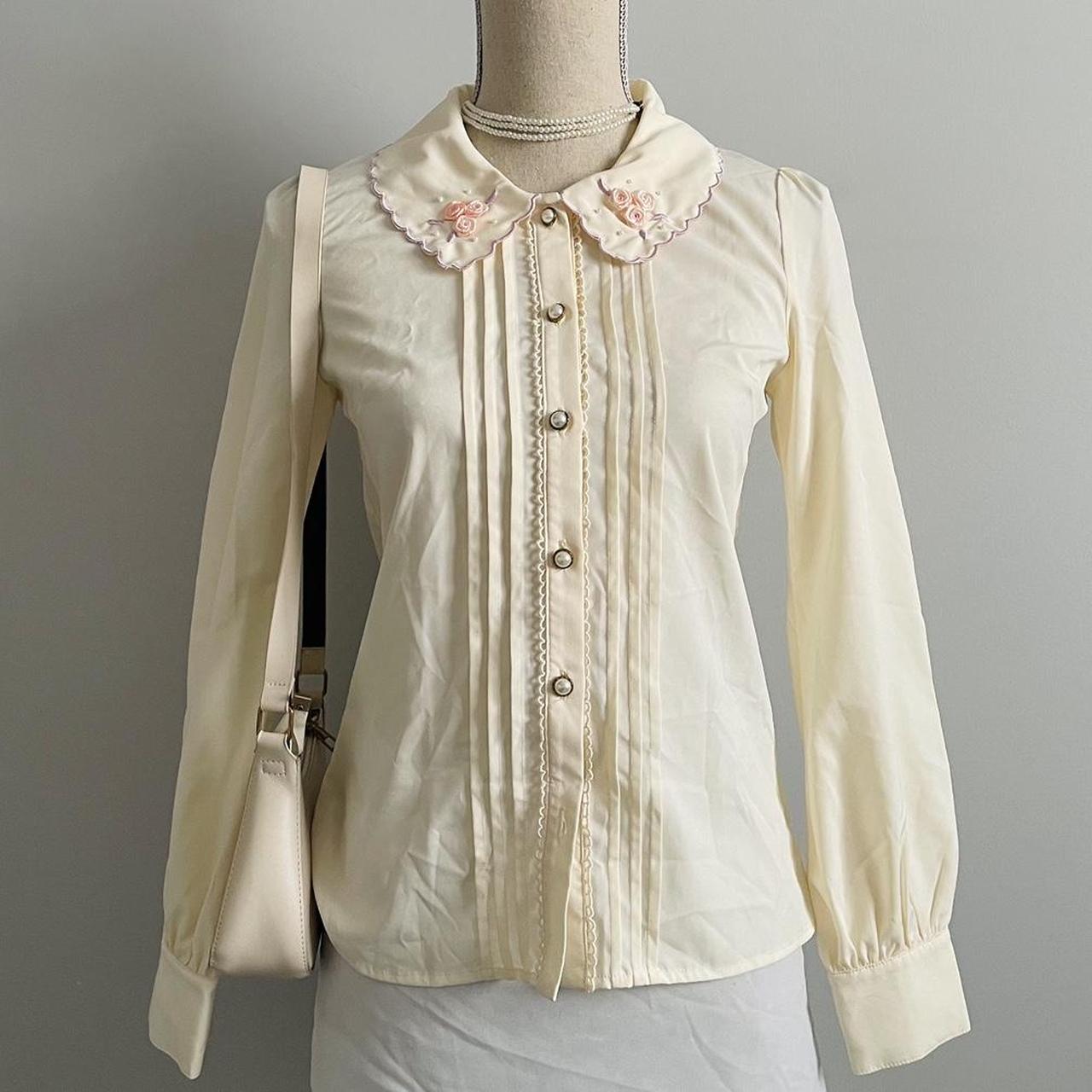 light cream colored button up blouse from japanese... - Depop