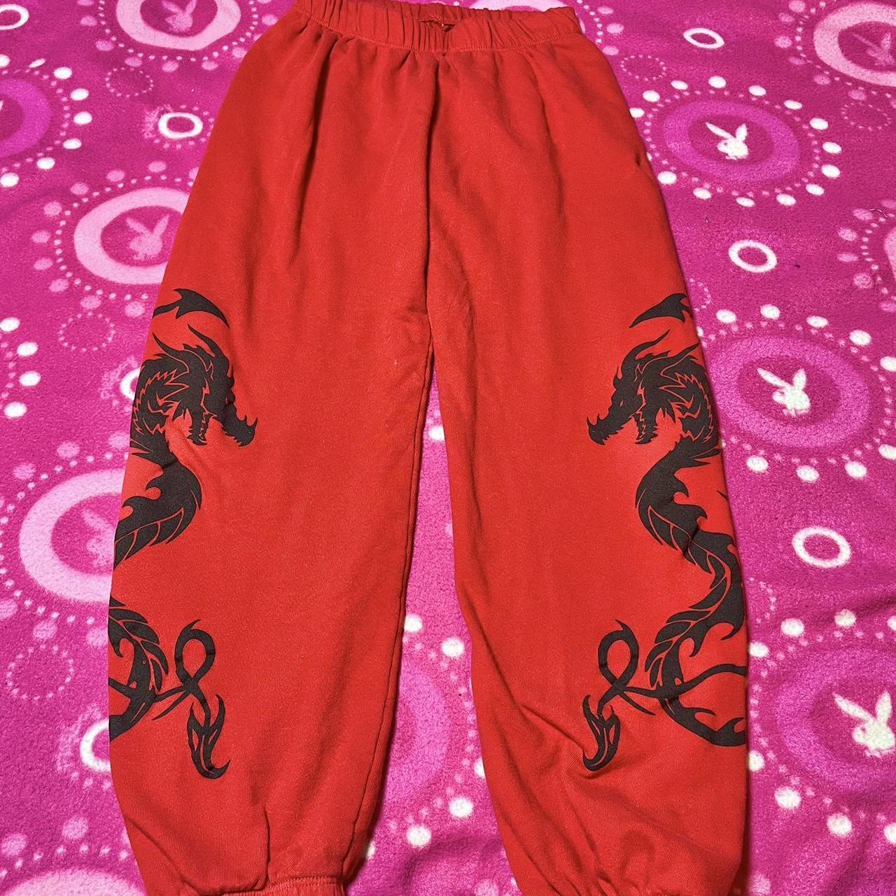 Red sweats with dragon print. Size small. Good... - Depop